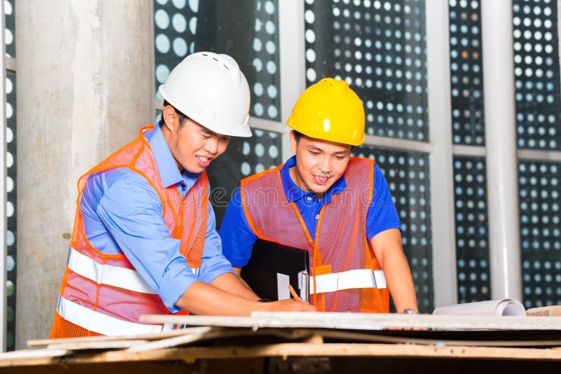Asian Architect and Supervisor on Building Site Stock Image - Image of ...
