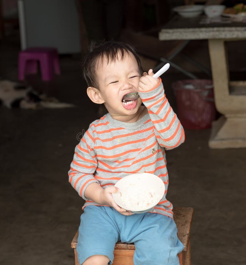 Asian Baby Boy Eating Fried Rice by Spoon by Him Self Stock Image ...