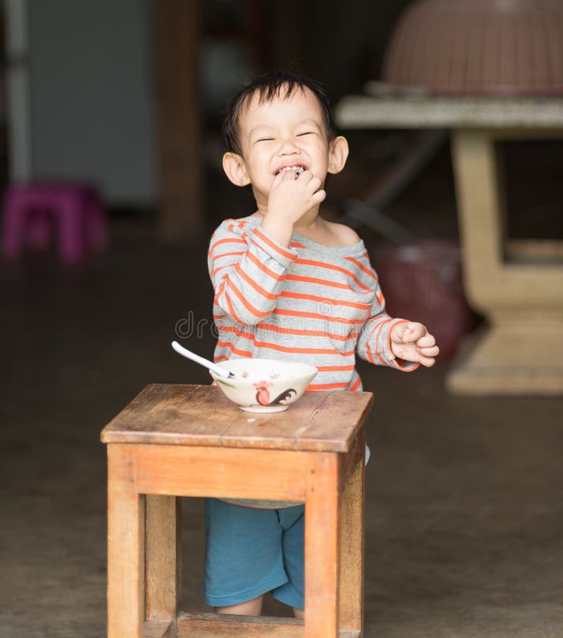 Asian Baby Boy Eating Fried Rice by Spoon by Him Self Stock Photo ...