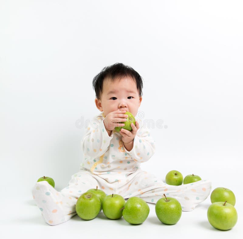 Asian Baby Eating Green Apple Stock Photo - Image of baby, healthy ...
