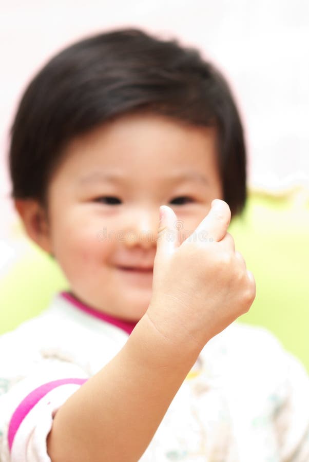 Asian baby gesture stock image. Image of laugh, finger - 13073845