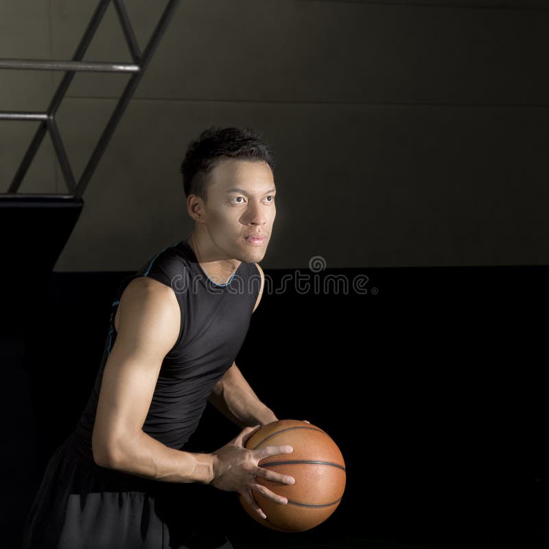 Asian basketball player stock image. Image of playing - 59757553
