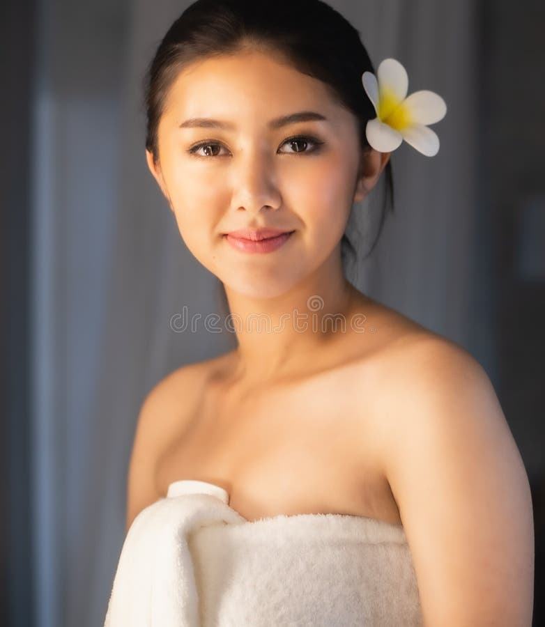 Asian Beautiful Young And Healthy Woman In Spa Salon Massage