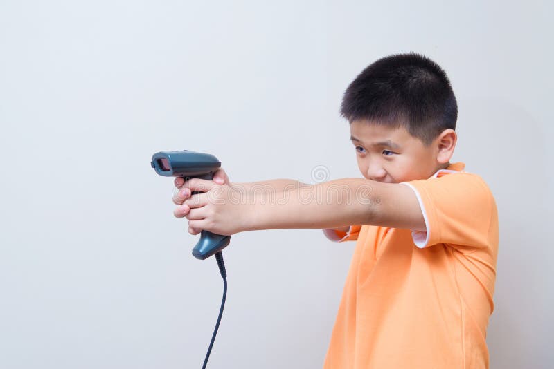 Asian Boy Aim a Fake Gun Made with Barcode Scanner Stock Image - Image ...