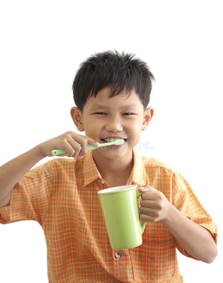 Asian boy brushing teeth. stock photo. Image of health - 23423566