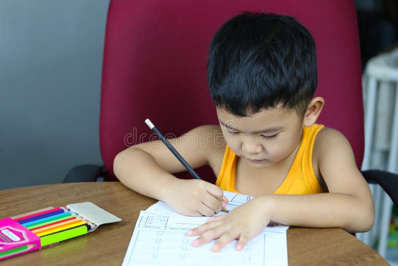 Chinese Boy Doing His Homework Home Stock Photos - Free & Royalty-Free ...