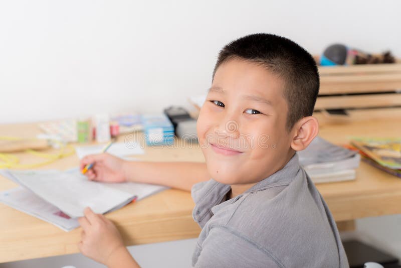 Asian Boy Doing Homework at Home Stock Photo - Image of hand, education ...