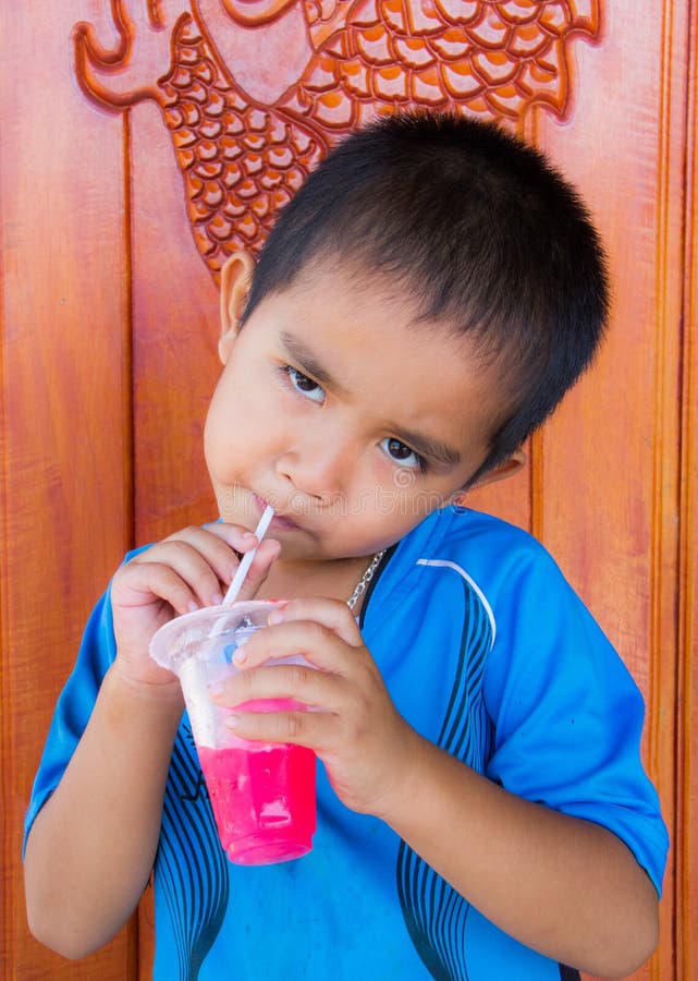 Asian boy drinking stock image. Image of happiness, close - 48152655