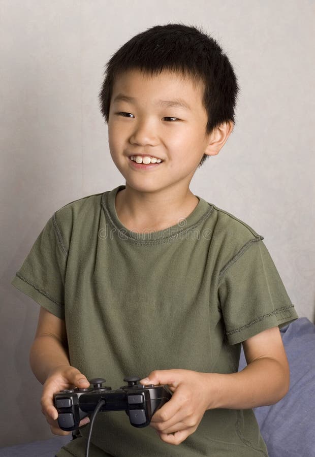 Asian boy gamer stock photo. Image of nintendo, controller - 1390310