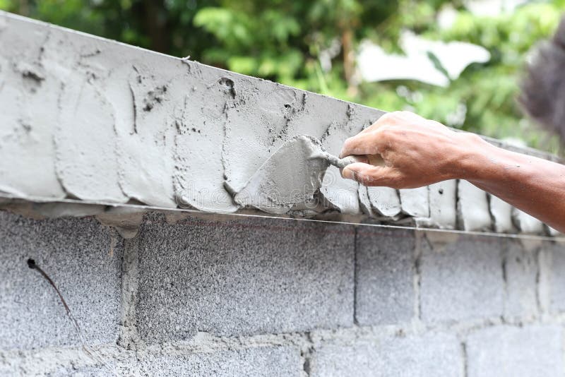 Asian Boy Hand Using Trowel with Wet Concrete Wall Stock Photo - Image ...