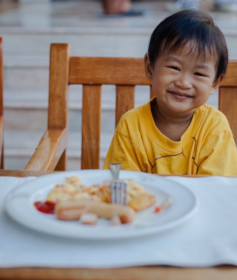 Asian Boy Having a Breakfast Stock Image - Image of young, yummy: 97491905