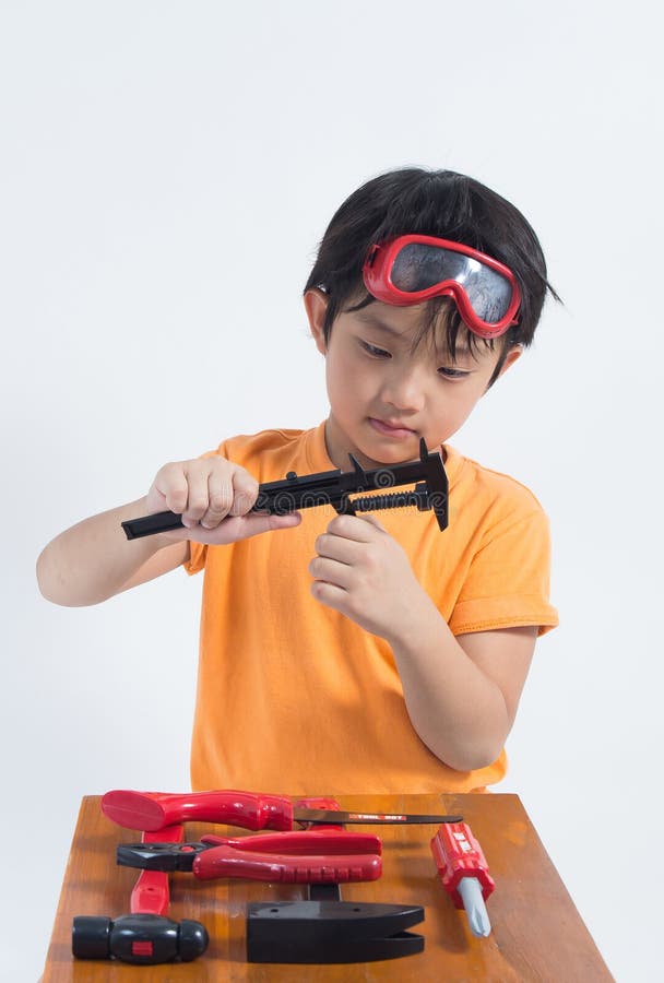 Asian boy play engineer stock image. Image of construction - 66444027