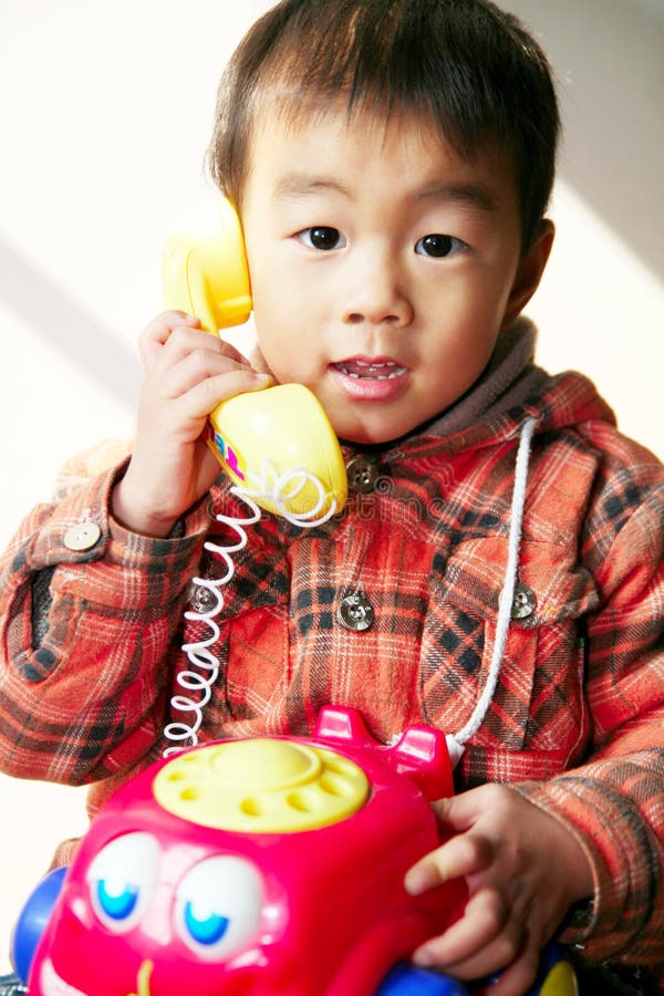 Asian Boy Play with Telephone Stock Image - Image of eyes ...