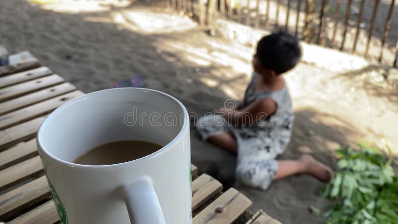 Asian Boy Playing Alone Enthusiastically Digging Sand with Bare Hands ...