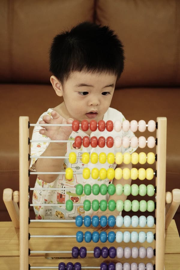 Asian Boy Playing Colorful Abacus at Home Stock Photo - Image of enjoy ...