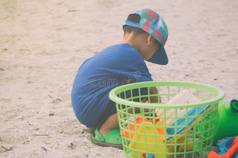 Asian Boy is Playing with Colorful SandBox Toy. Stock Photo - Image of ...