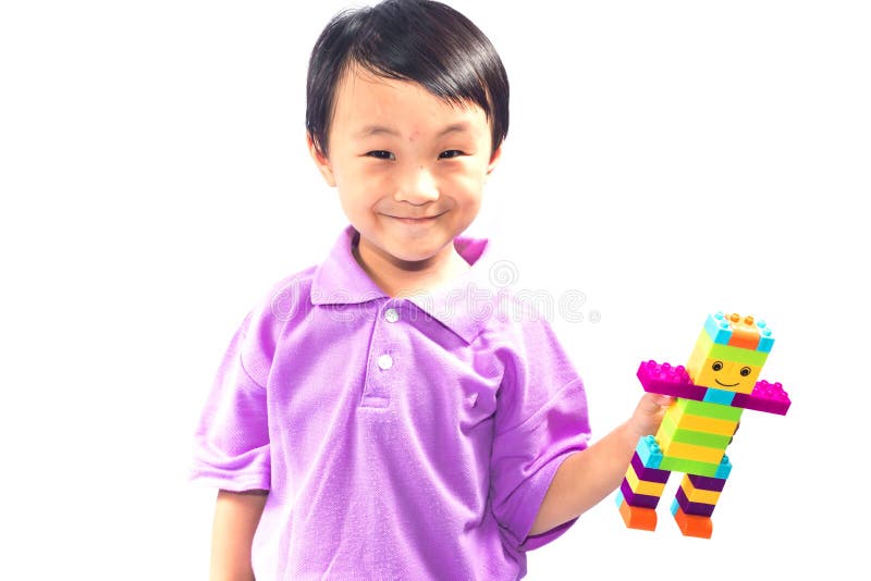 Asian boy playing Lego stock photo. Image of cute, preschooler - 56627664