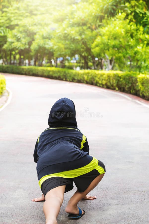 Asian Boy in Position To Run with Arms on the Ground Stock Photo ...
