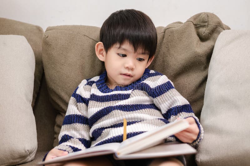 Asian Boy Reading Book Sofa Learning Outside Classroom Stock Photos ...