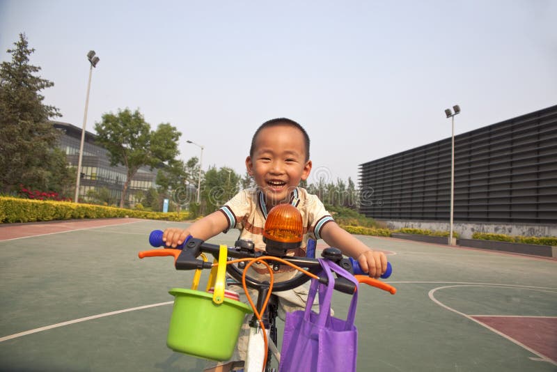 Asian Boy Riding Bike Picture. Image: 14623561
