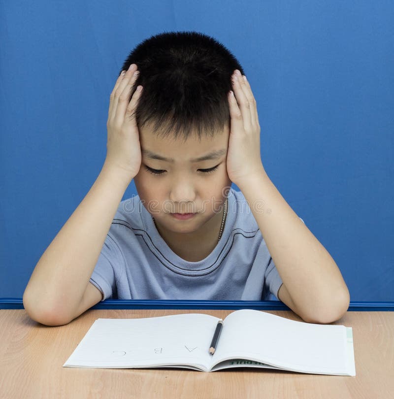 Asian Boy Serious Read a Book Stock Photo - Image of little, classroom ...