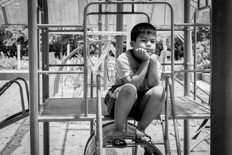 Asian Boy Sitting Alone at Playground Stock Photo - Image of child ...