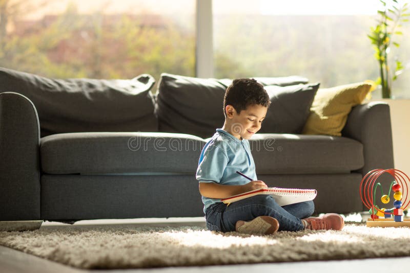 Asian Boy Sitting on a Carpet Stock Image - Image of home, room: 370393723