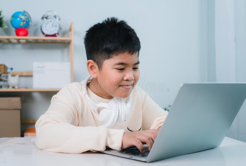 Asian Boy Student Using Computer Laptop Learning. Educational of Tech ...
