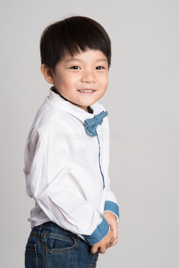 Asian boy studio portrait stock image. Image of laugh - 79432397