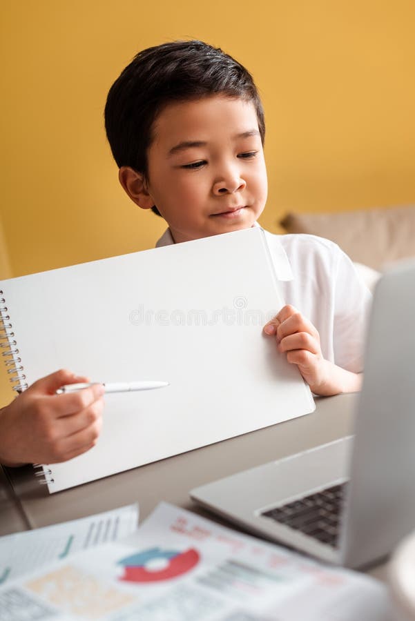 Asian Boy Studying Online with Notepad Stock Photo - Image of gadget ...