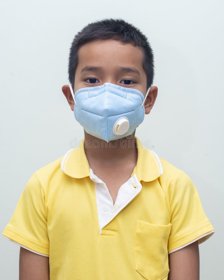 Asian Boy Wears a Protective Mask. COVID-19. Stock Image - Image of ...