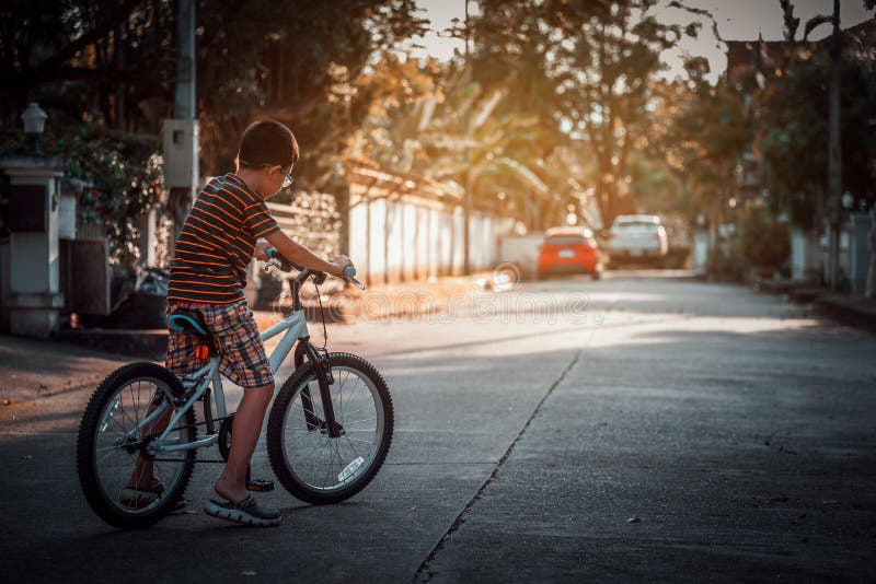 Asian Boys Practice Cycling Alone Stock Photo - Image of cycling ...