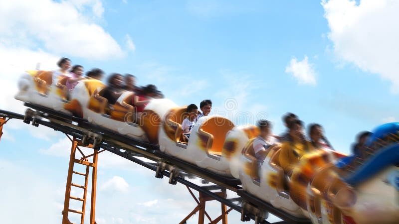 Asian Boys on a Roller Coaster Ride. Selected Focus Stock Photo - Image ...