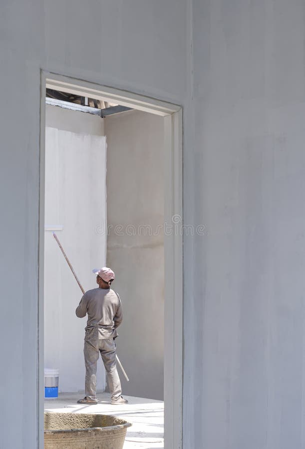 Asian Builder Worker Applying Primer White Paint on Concrete Wall in ...