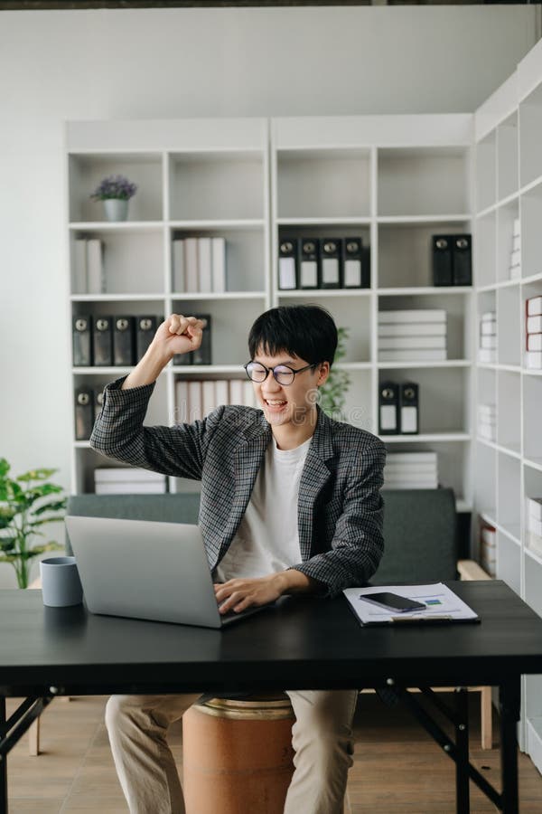 Asian Business Man are Delighted and Happy with the Work they Do on ...