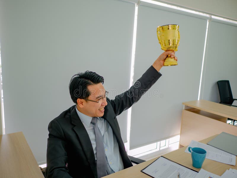 Asian Business Man Get the Golden Trophy Stock Image - Image of laptop ...