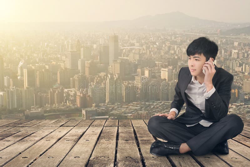 Asian Business Man Take a Call and Sit on Ground Stock Photo - Image of ...