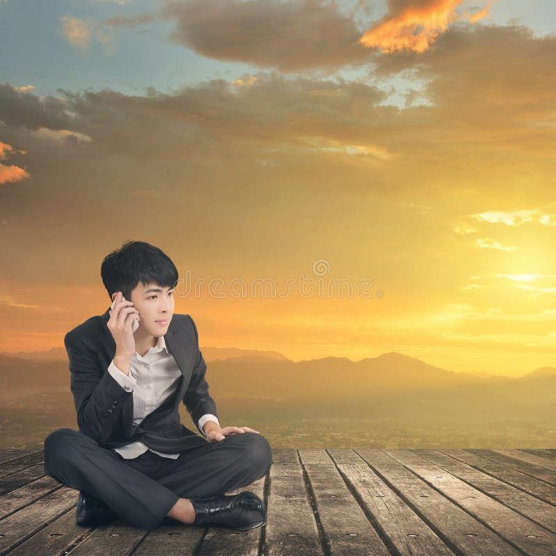 Asian Business Man Take a Call and Sit on Ground Stock Image - Image of ...
