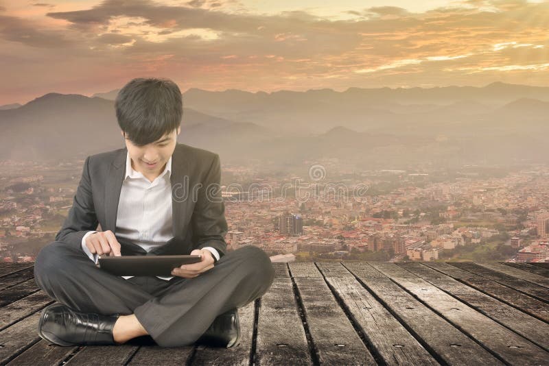 Asian Business Man Using Pad and Sit on Ground Stock Image - Image of ...