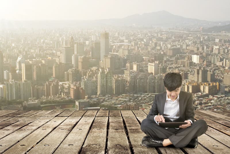 Asian Business Man Using Pad and Sit on Ground Stock Photo - Image of ...