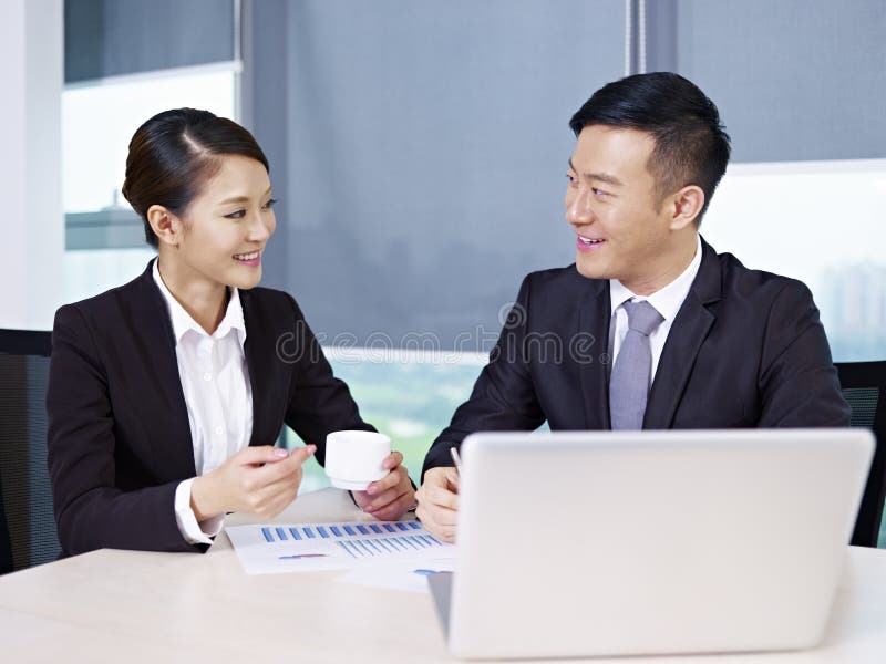 Young Asian Businessman Smiling at Business Meeting, Job Interview, in ...