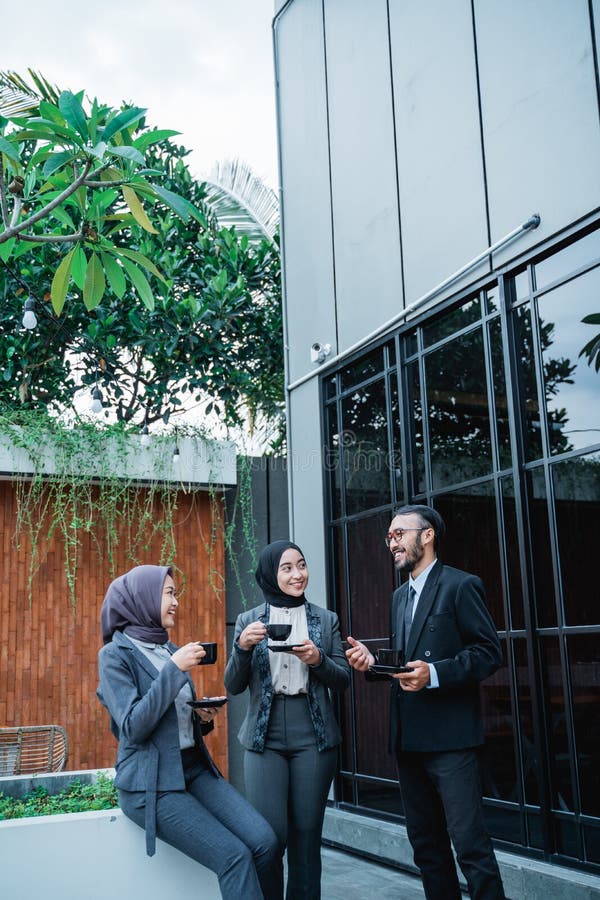 Asian Business People Having Conversation during Working Break Stock ...