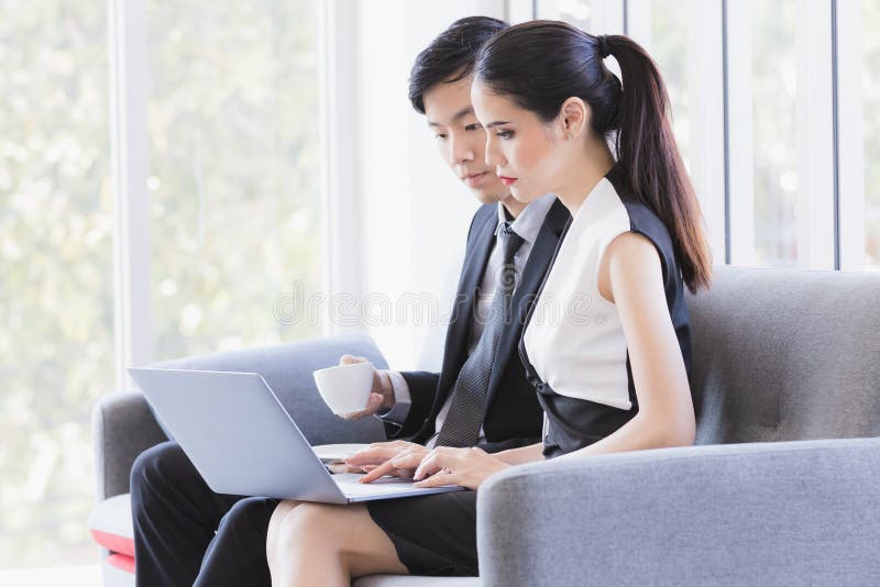 Asian Business People Using Laptop in Office Stock Image - Image of ...
