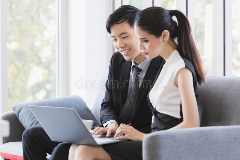 Asian Business People Using Laptop in Office Stock Photo - Image of ...