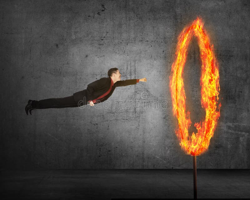 Asian Business Person Flying through Ring of Fire Stock Photo - Image ...