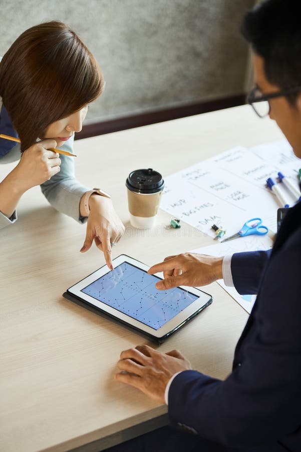 Business Team Analyzing Data Stock Photo - Image of executive, showing ... Business Team Analyzing Data Stock Photo - Image of executive, showing ...