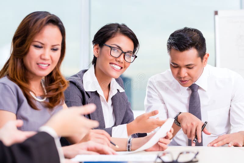 Asian Business Team Brainstorming Stock Photo - Image of indonesian ...