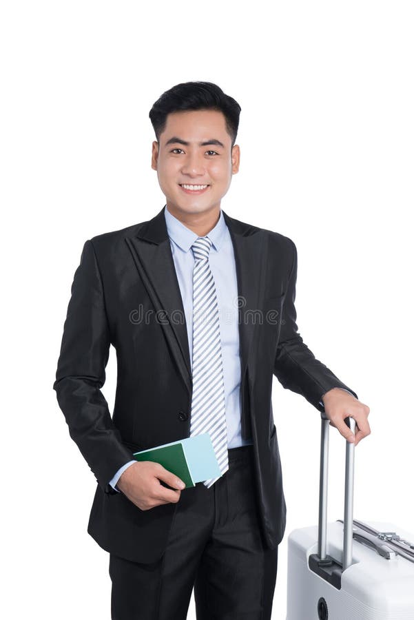 Asian Business Traveler Pulling Suitcase Holding Passport Stock Photos ... Asian Business Traveler Pulling Suitcase Holding Passport Stock Photos ...