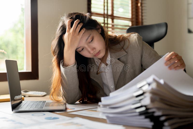 Asian Business Woman Stressed Office Worker Overloaded with Paperwork ... Asian Business Woman Stressed Office Worker Overloaded with Paperwork ...