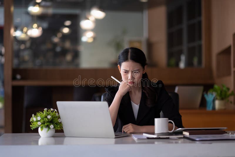 Asian Business Woman Thinking Solving Problem at Work, Worried Serious ...